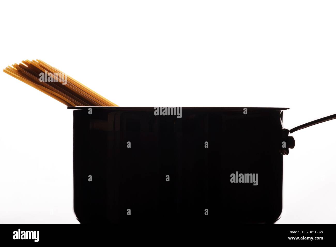 Spaghetti Pasta Cooking in a Stainless Steel Pot on a White Background ...