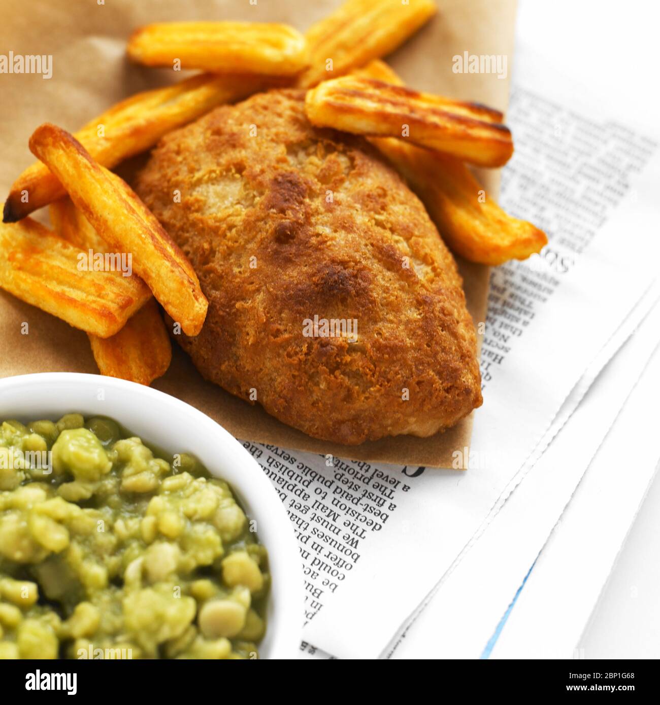 Fish wrapped in newspaper hi-res stock photography and images - Alamy