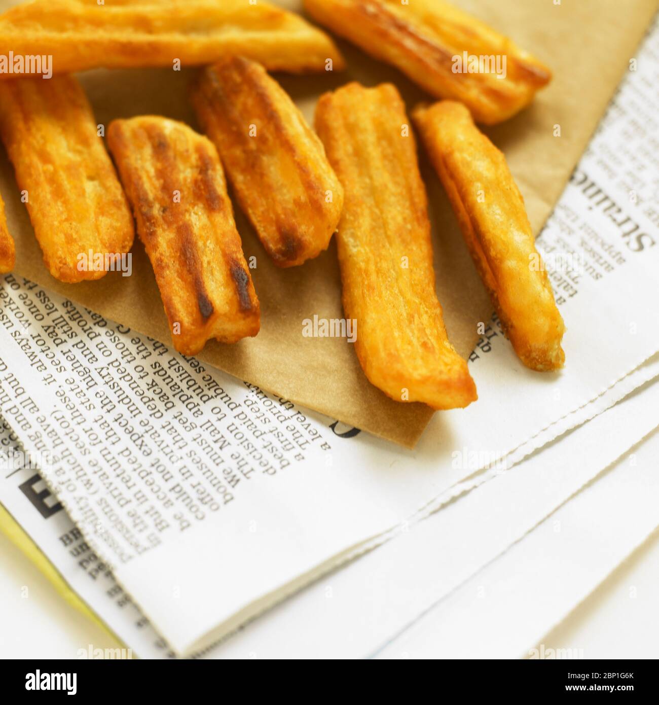 Beer Batter Chips on Newspaper Stock Photo - Alamy