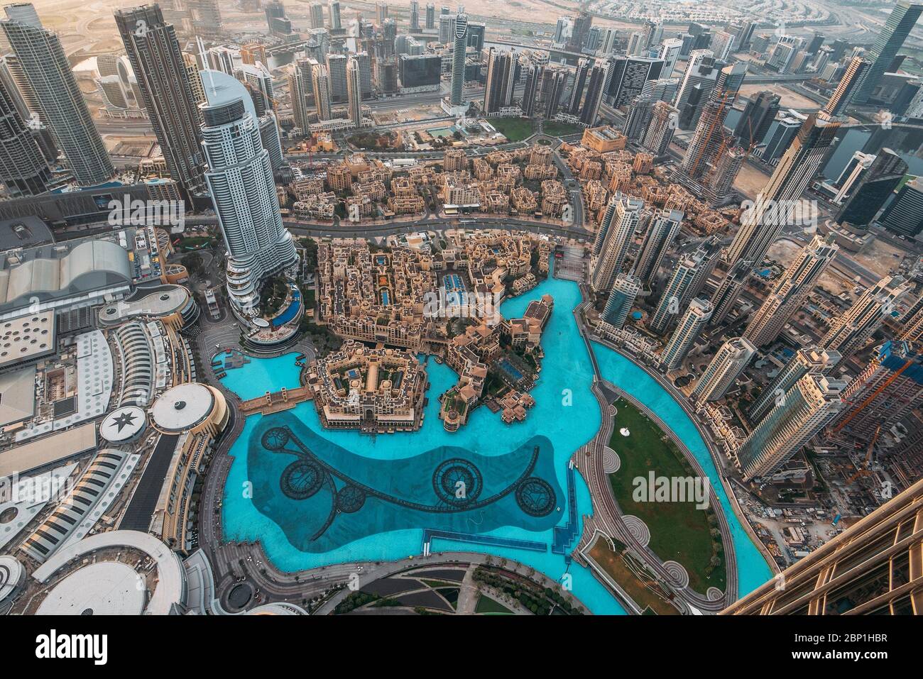 Aerial top view of Dubai famous fountains pool from above in morning ...
