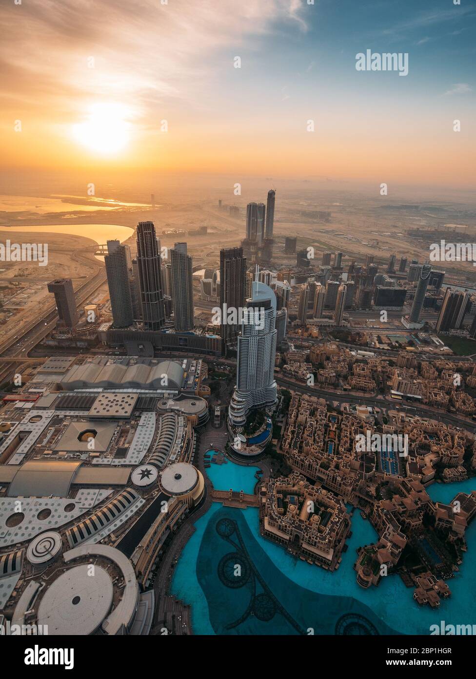 Aerial top view of Dubai famous fountains pool from above in morning ...