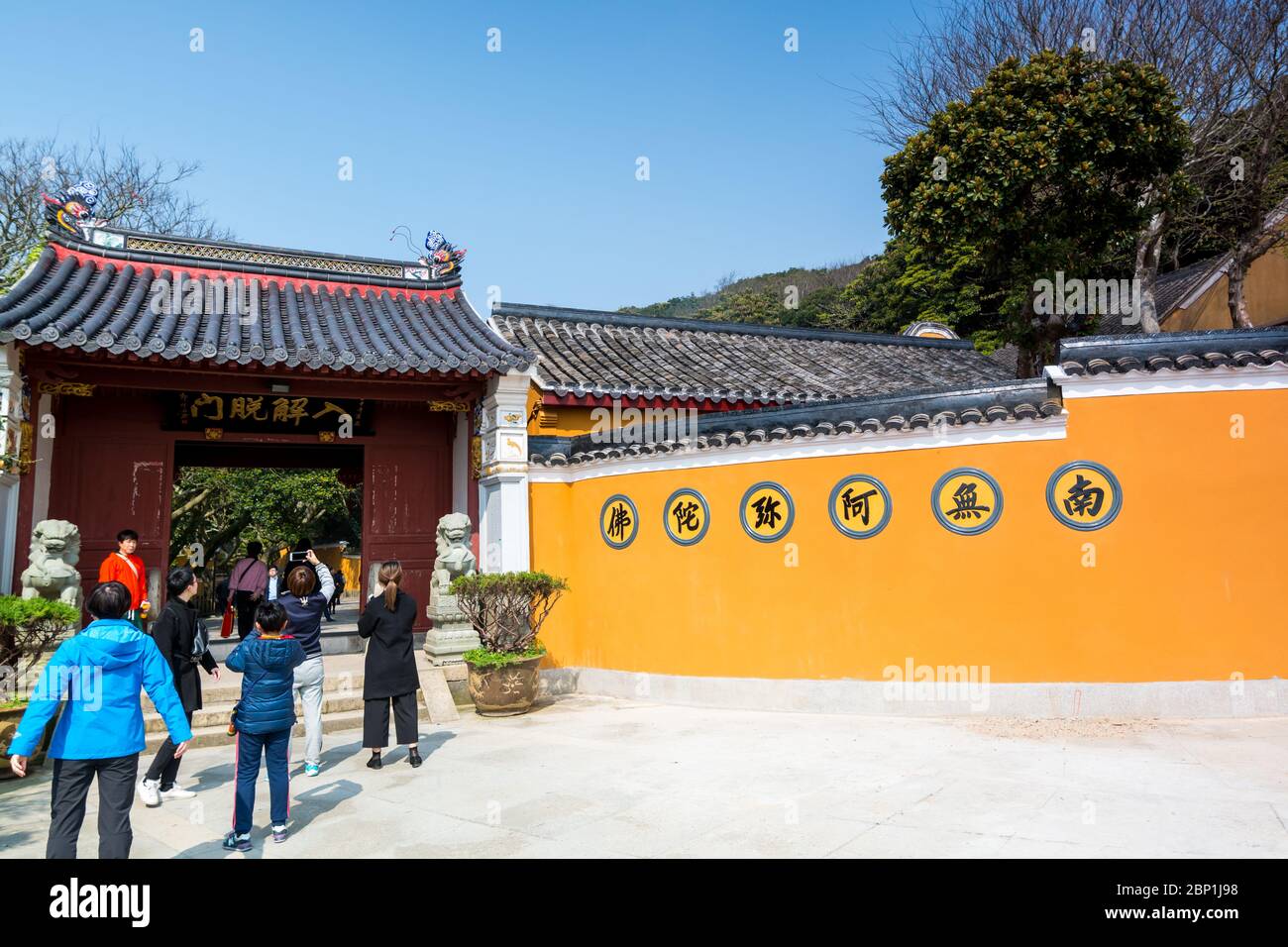 A lot of Pilgrims praying at the temple in Mount Luojia, which lies in ...