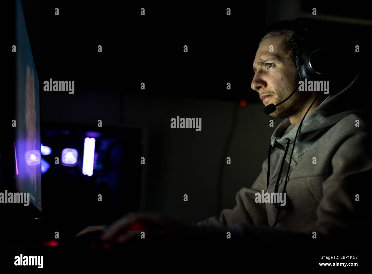 Professional Gamer or Streamer Playing First-Person Shooter Online ...