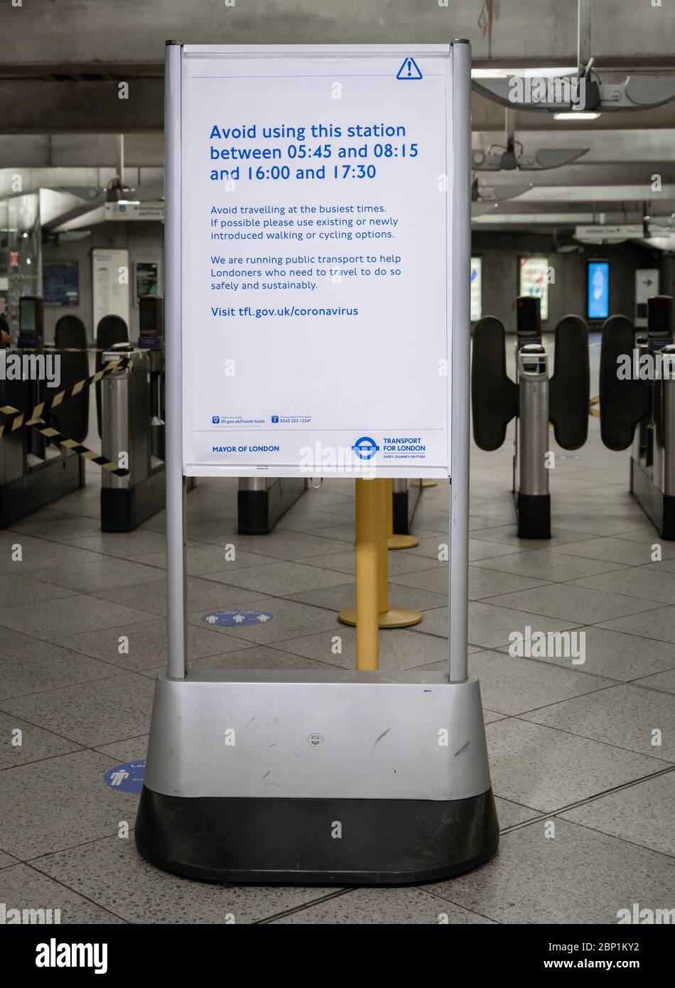 Posters on the London Underground remind people to avoid travel on ...