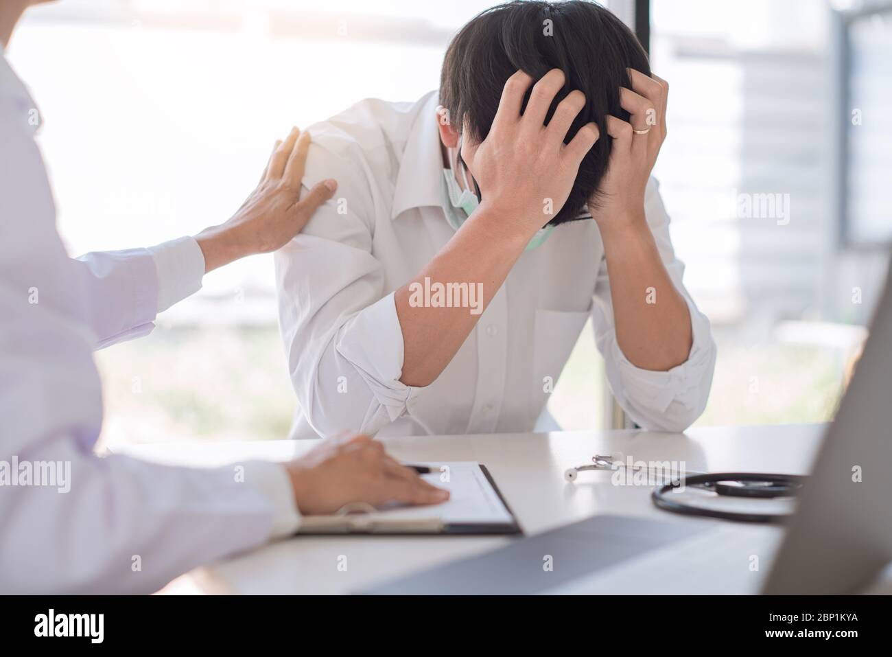 Doctor examination crying hi-res stock photography and images - Alamy