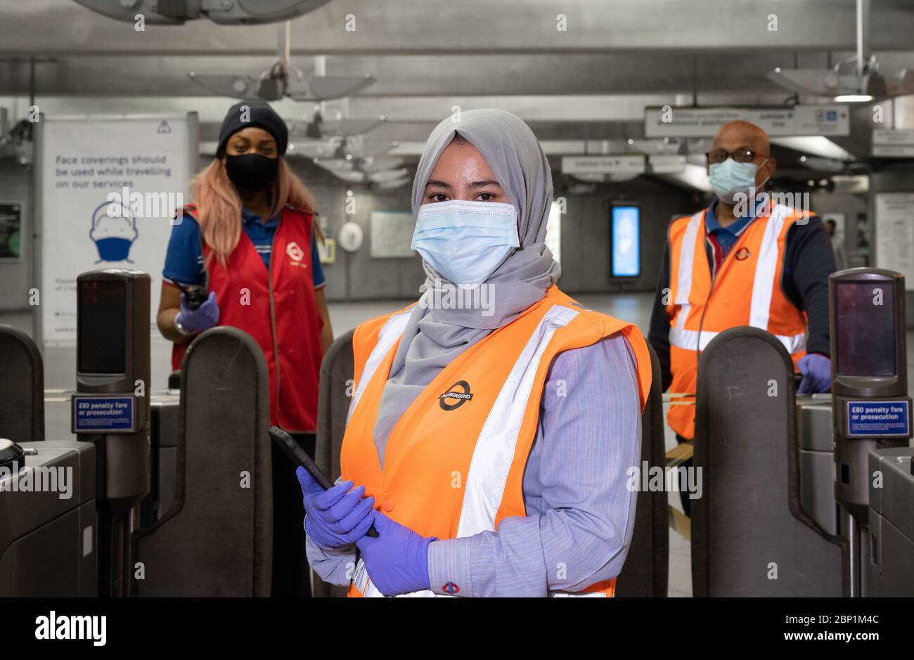 London Underground staff wearing protective masks at Westminster Tube ...