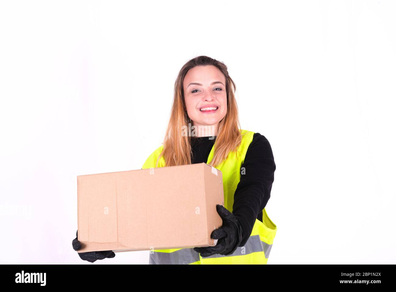postman with yellow giachet worker in the white background Stock Photo ...