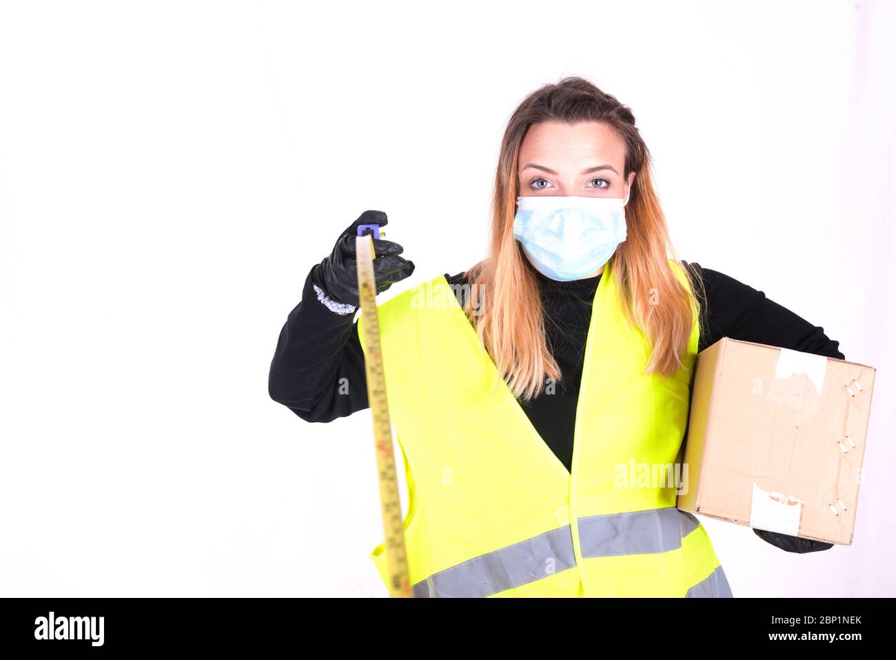 postman with yellow giachet worker in the white background Stock Photo ...