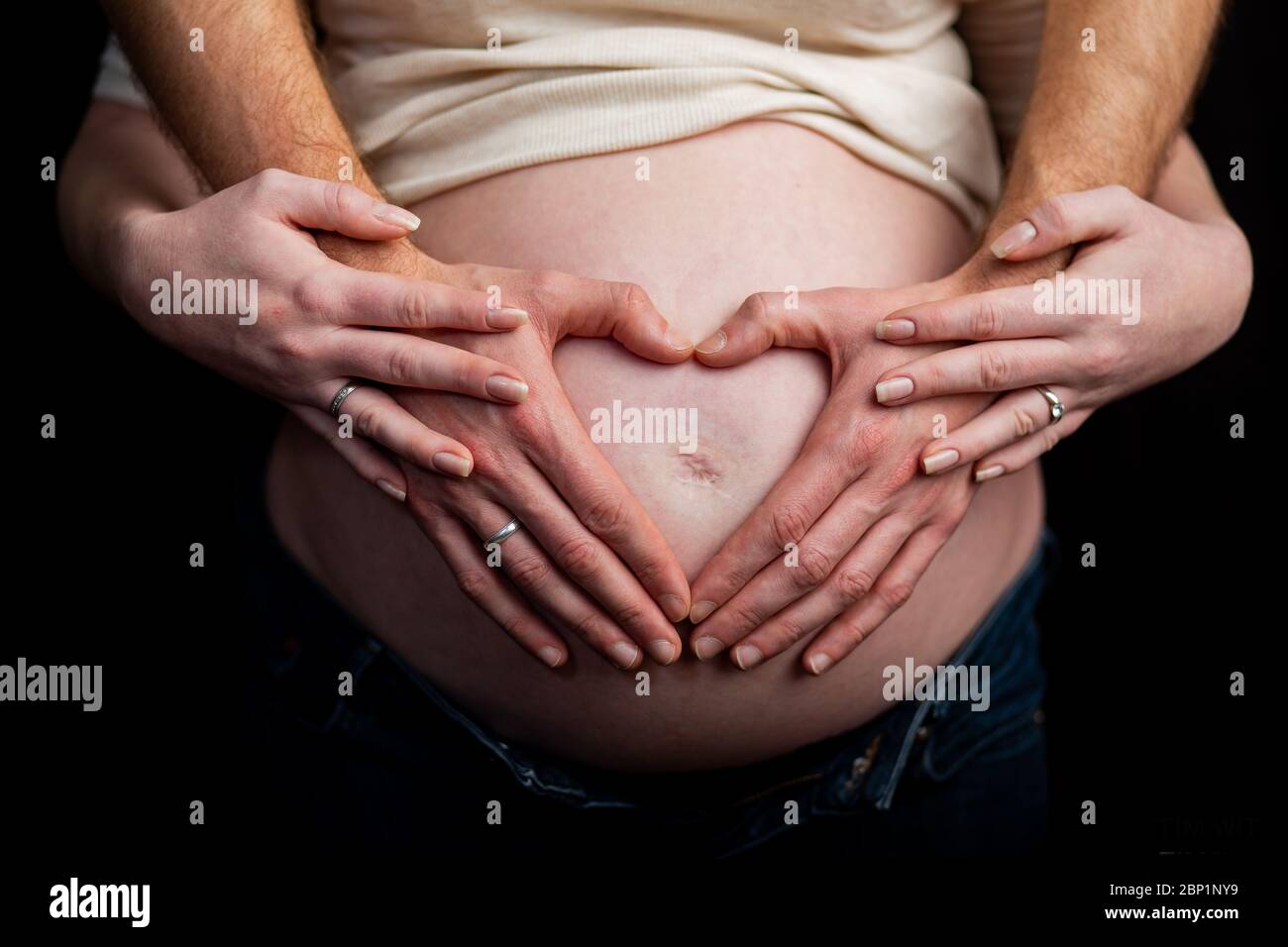 Baby in belly hi-res stock photography and images - Alamy