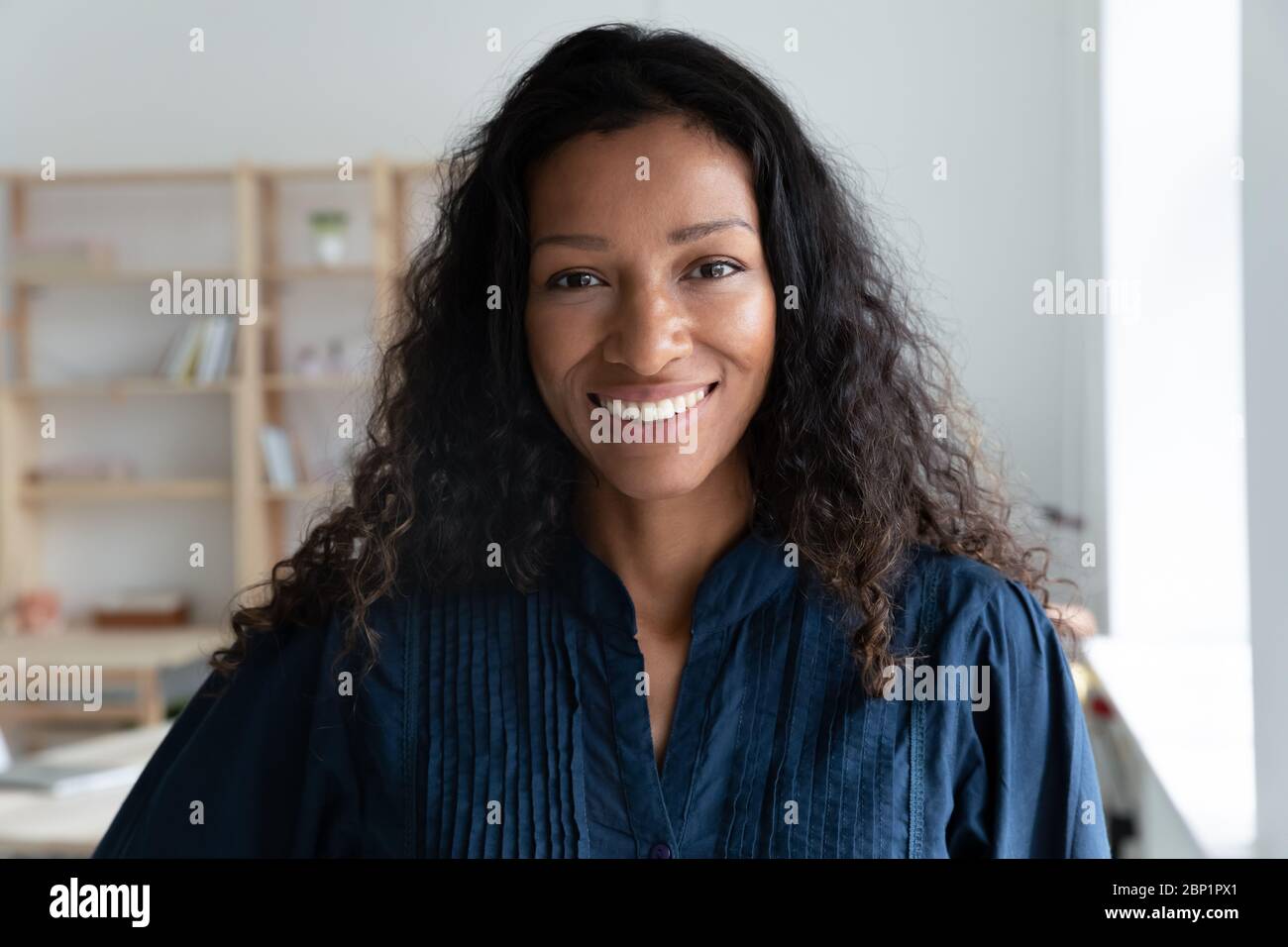 Portrait smiling sales person hi-res stock photography and images - Alamy