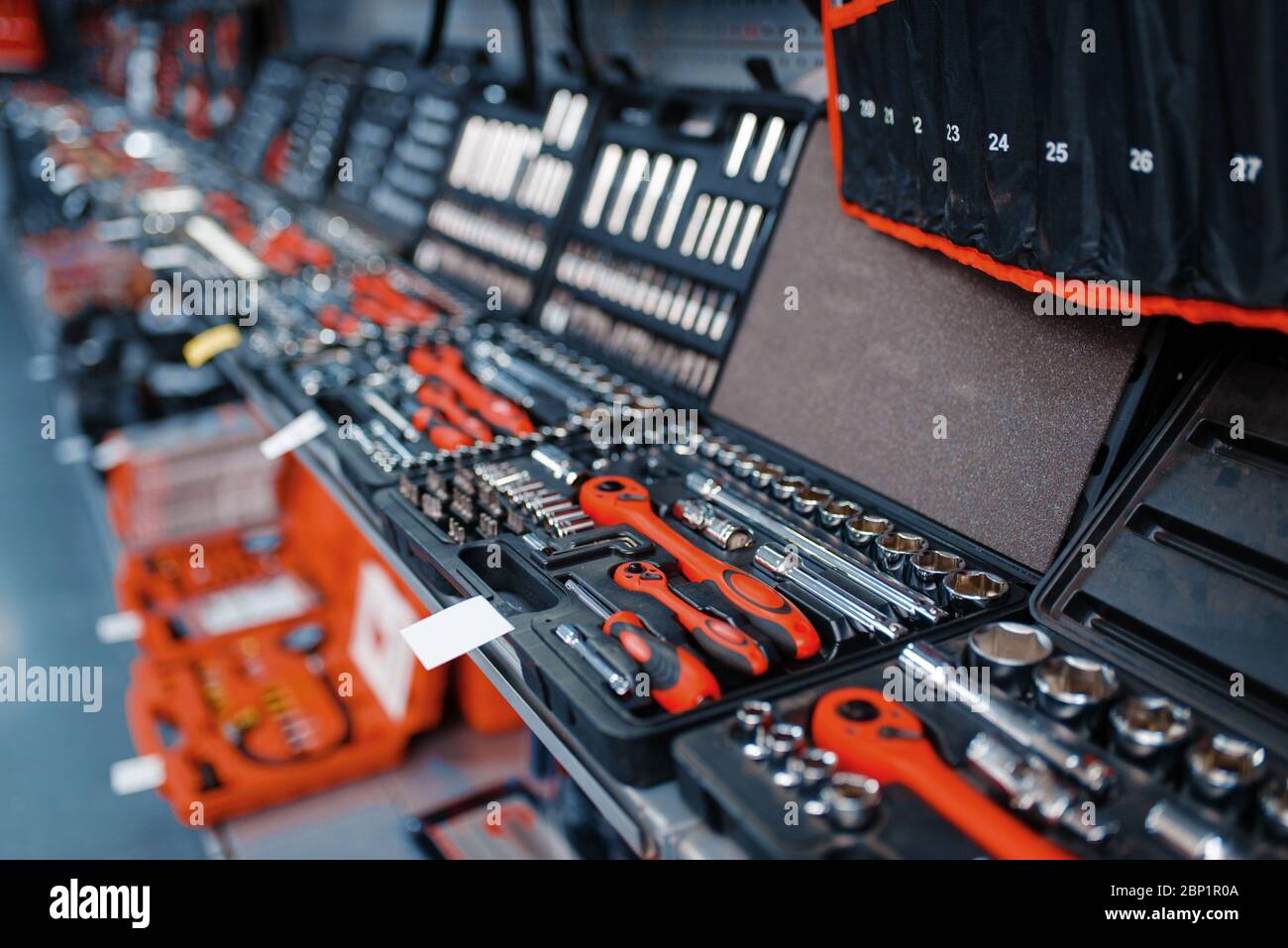 Showcase with toolboxes in tool store closeup Stock Photo - Alamy