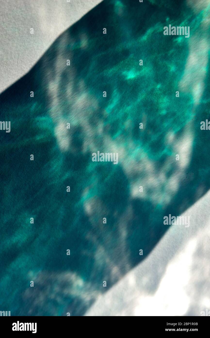 Light game reflections on paper Stock Photo - Alamy