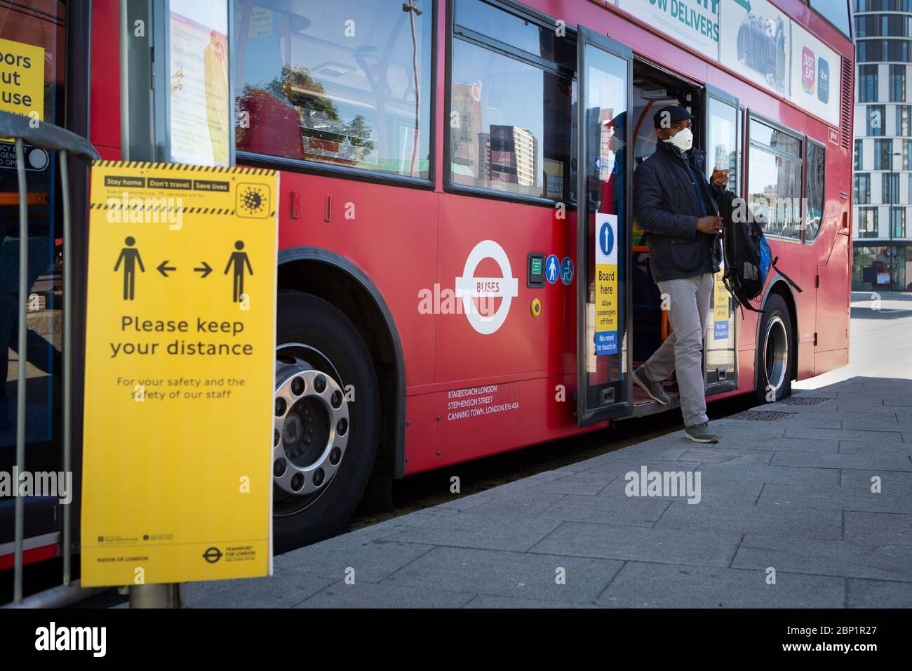 Signage reminding commuters to socially distance on bus services in ...