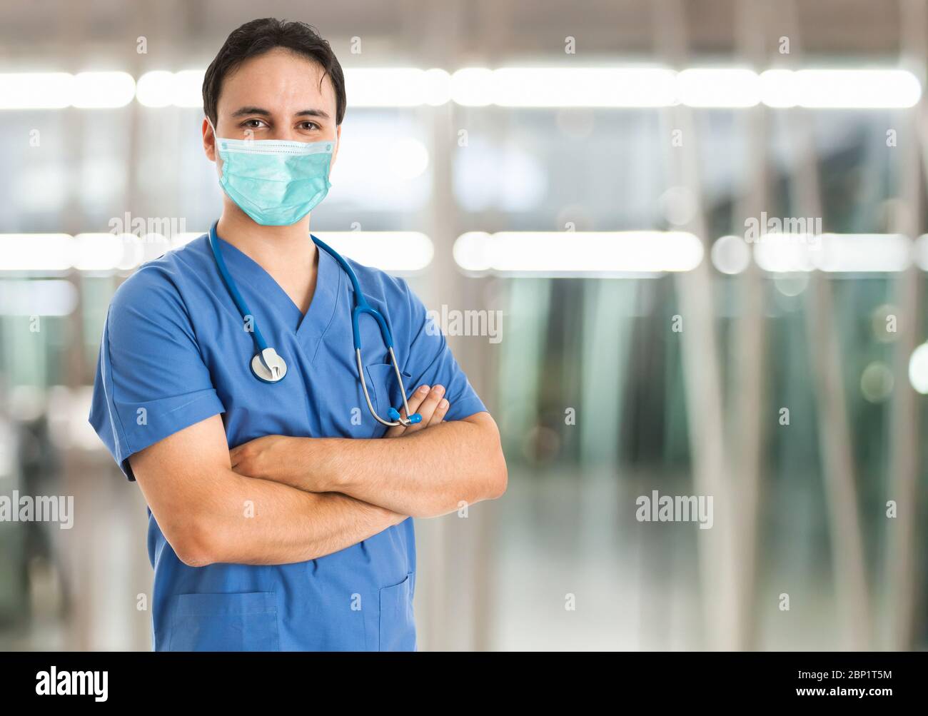 Masked doctor in the hospital, coronavirus healthcare concept Stock ...