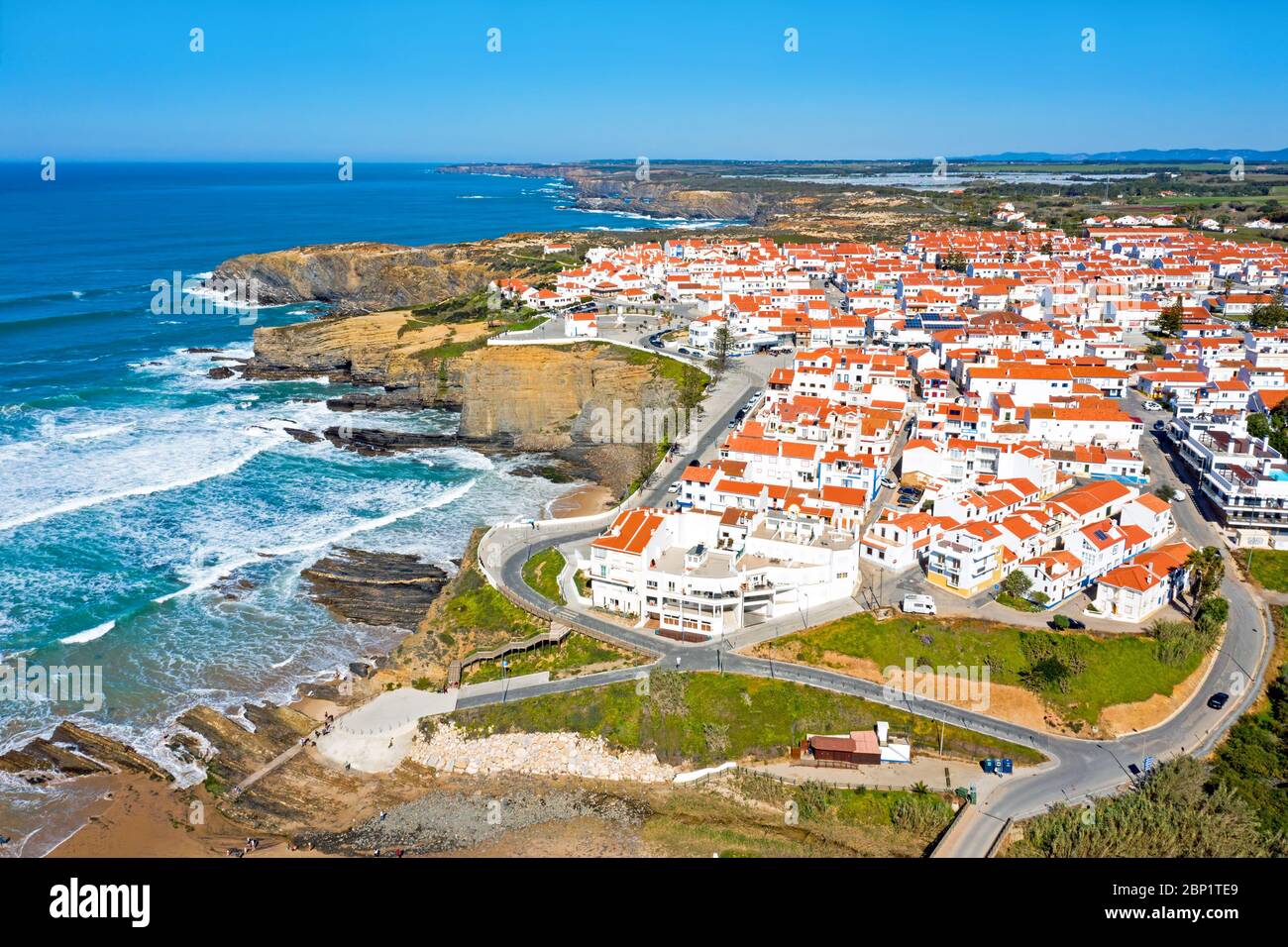 Aerial from the village Zambujeira do Mar at the west coast in Portugal ...