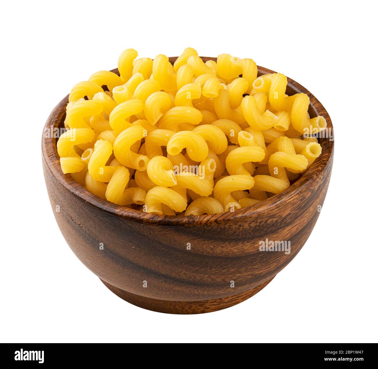 Cellentani pasta in wooden bowl isolated on white background Stock ...