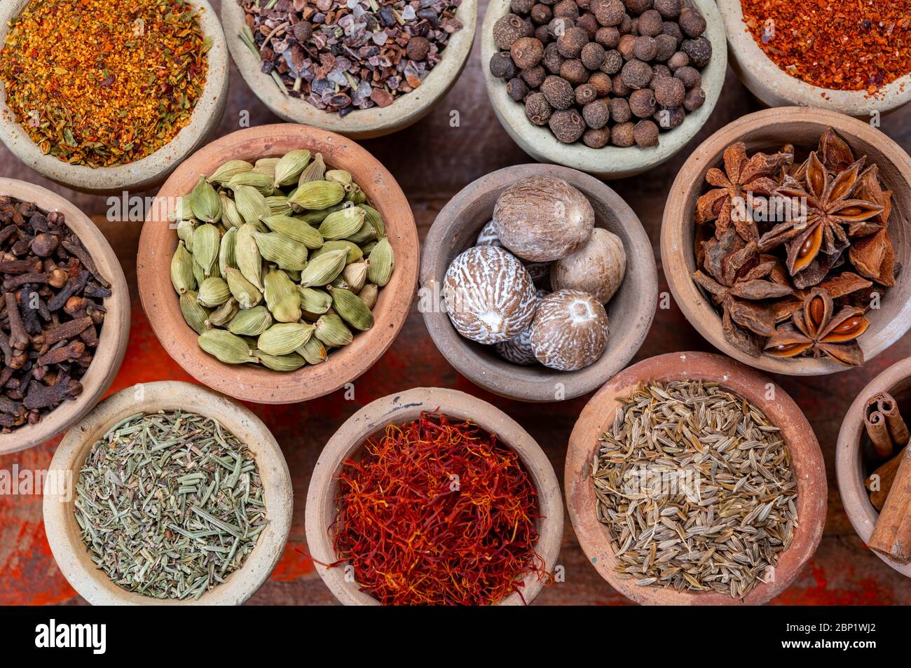 Indian spices collection, dried colorful condiment, nuts, pods and ...