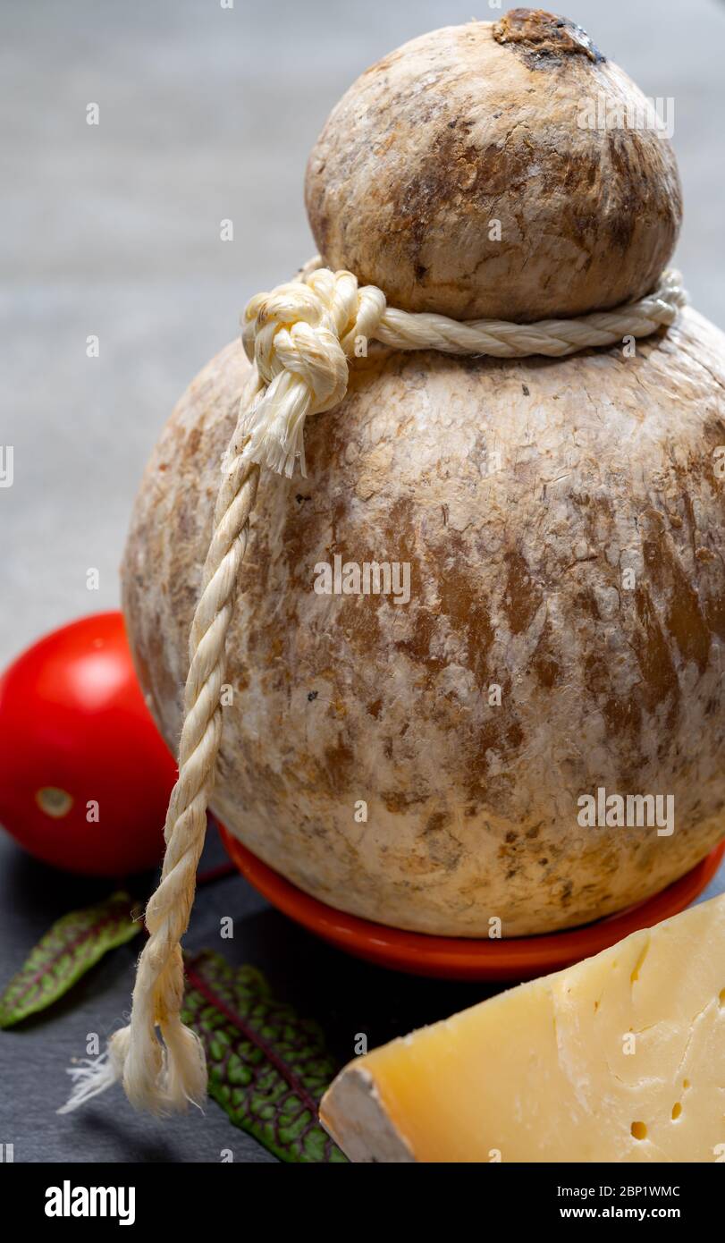 Italian semi hard matured caciocavallo cheese, handmade and aged in ...