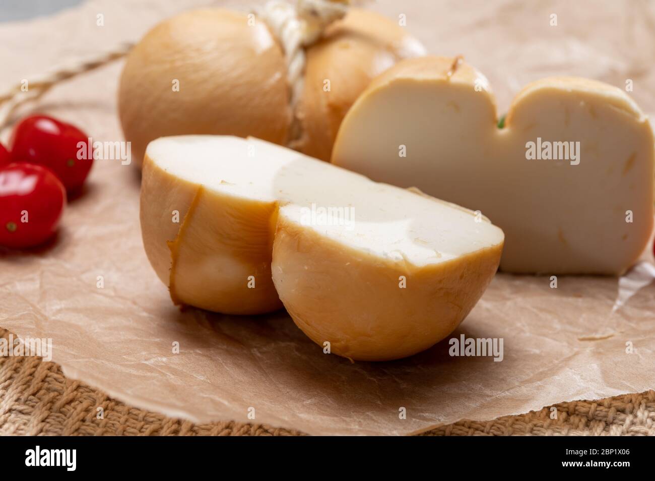 Italian semi hard handmade smoked scamorza cheese, from cow milk from ...