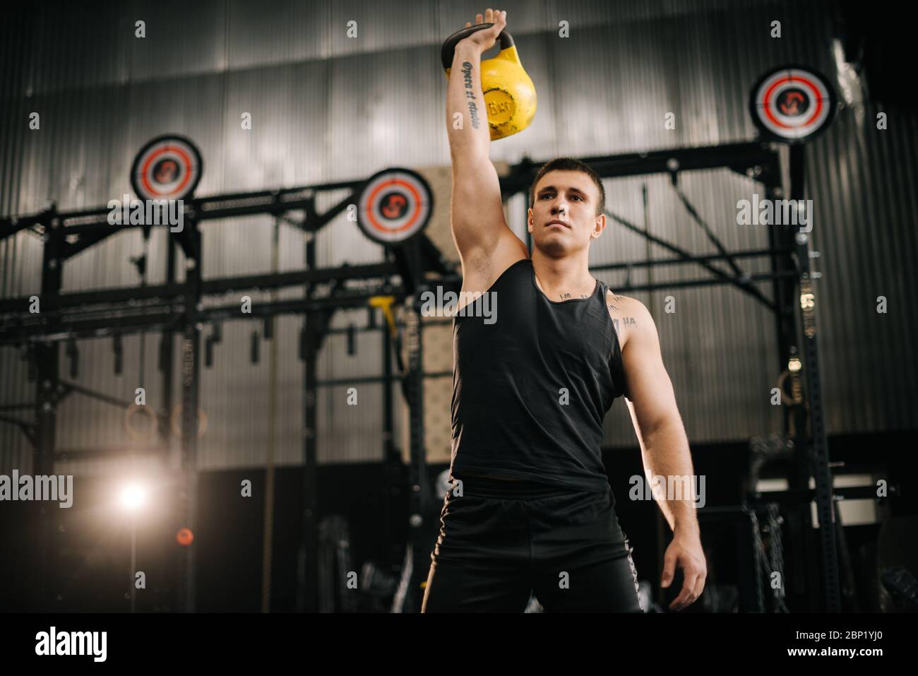 Young muscular man with perfect beautiful body wearing sportswear ...