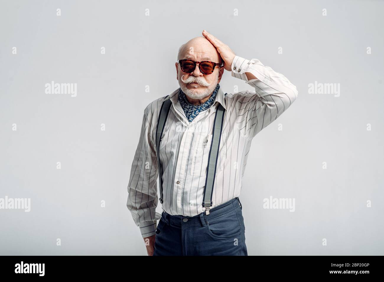 Mature man poses in sunglasses hi-res stock photography and images - Alamy