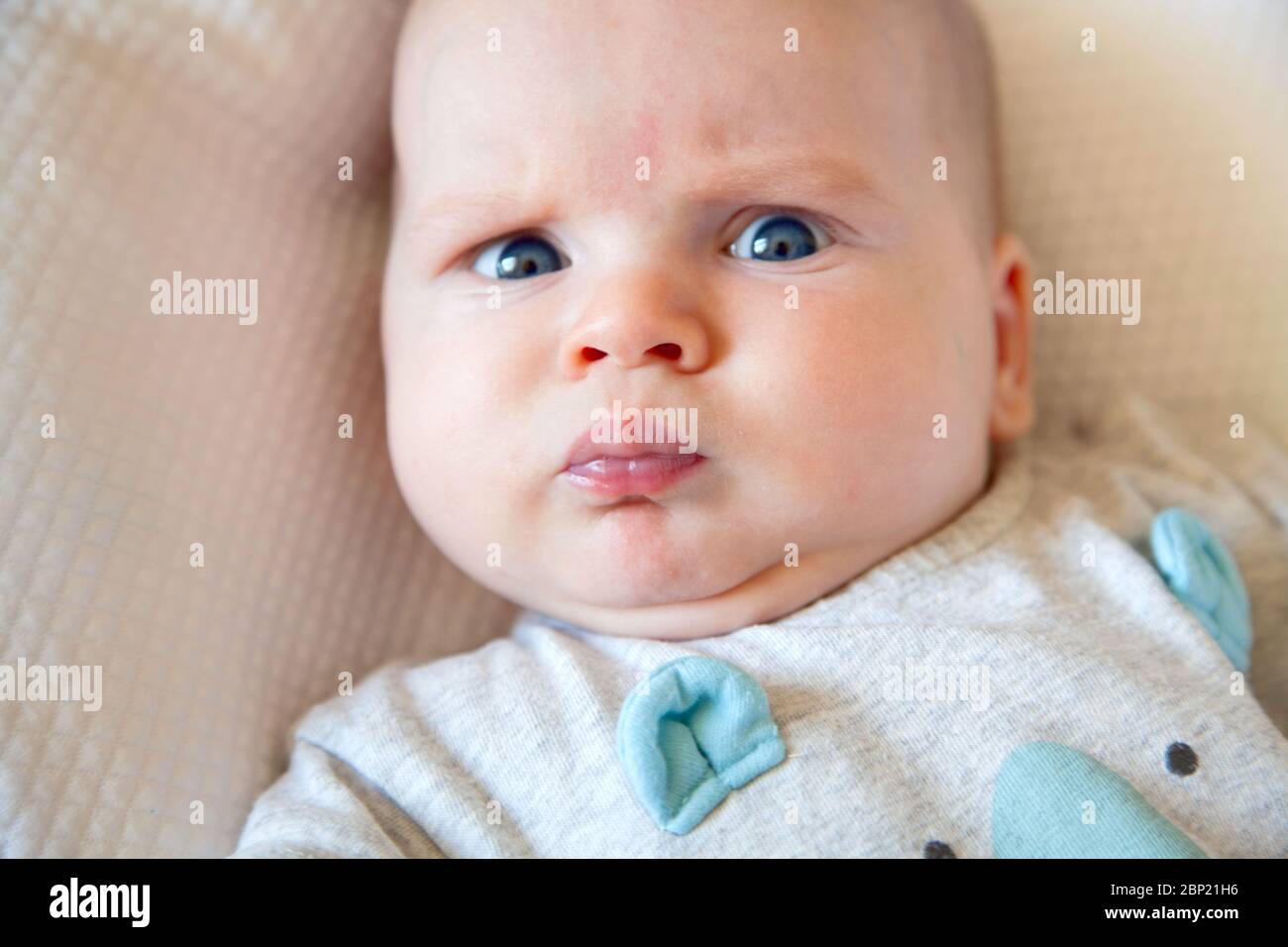 newborn baby, yellow background Stock Photo - Alamy
