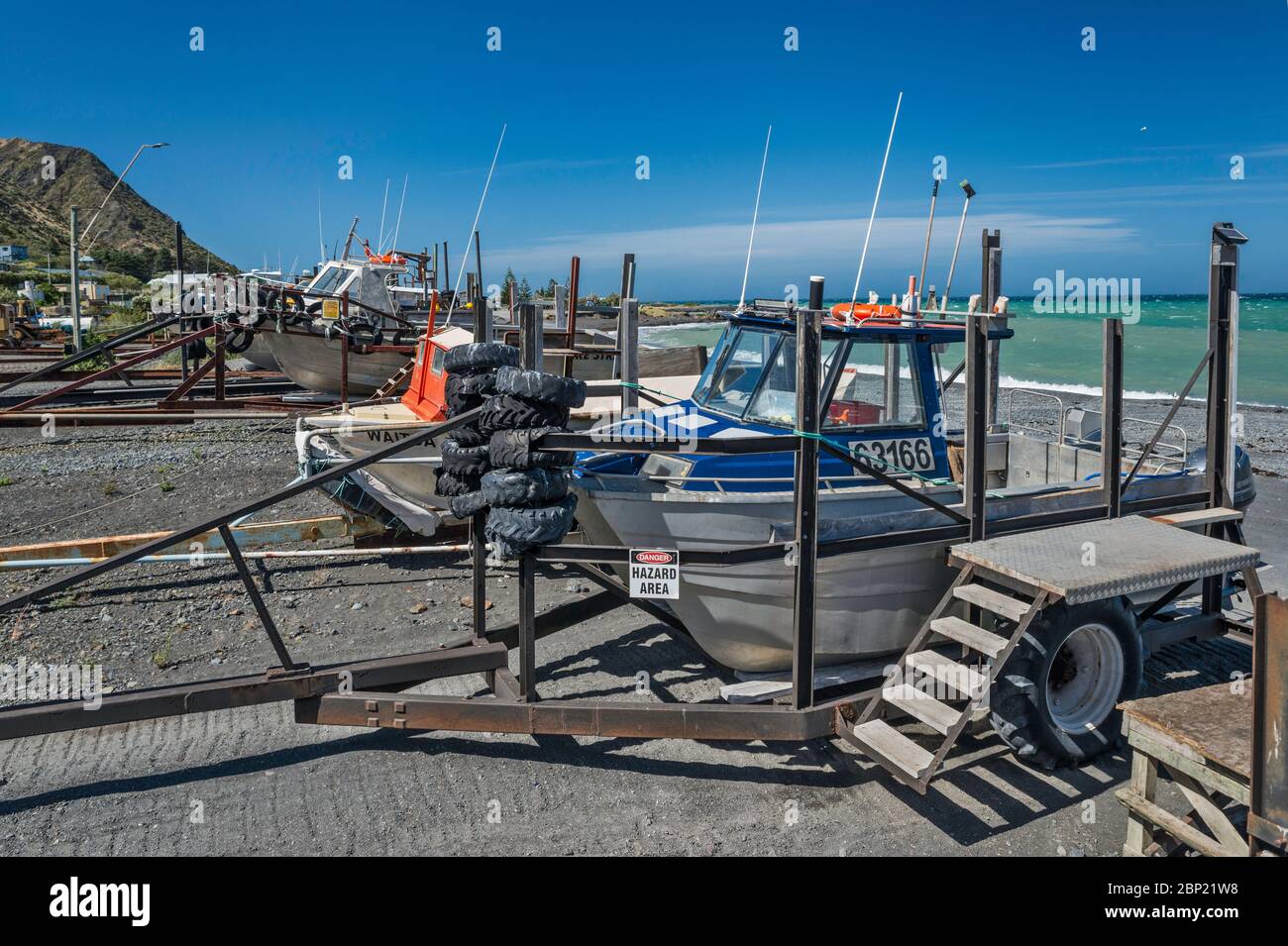 Fishing boats on beach in village of Ngawi, over Cook Strait, Cape ...