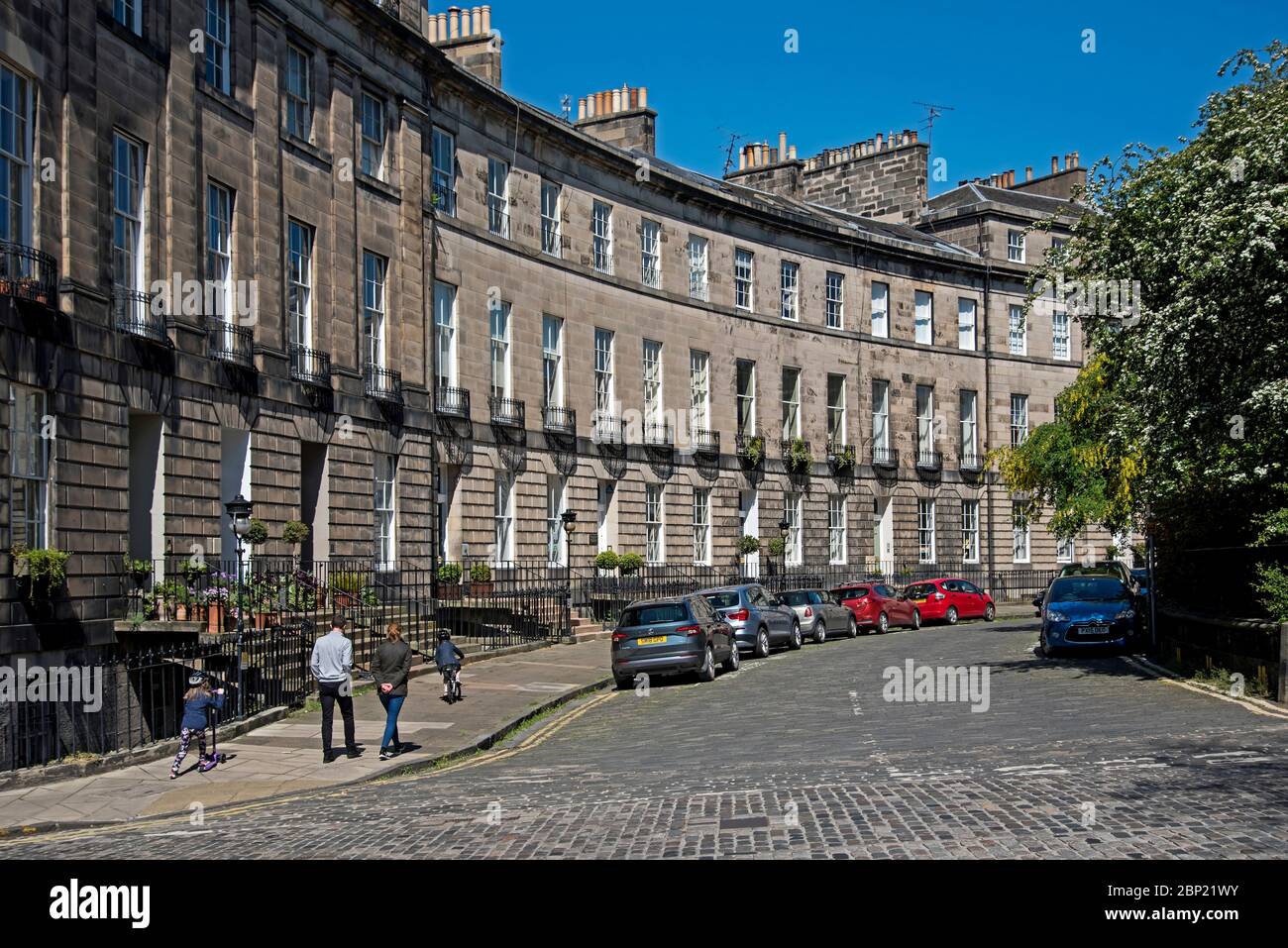 Family talking a stroll in Royal Circus in Edinburgh's Georgian New ...