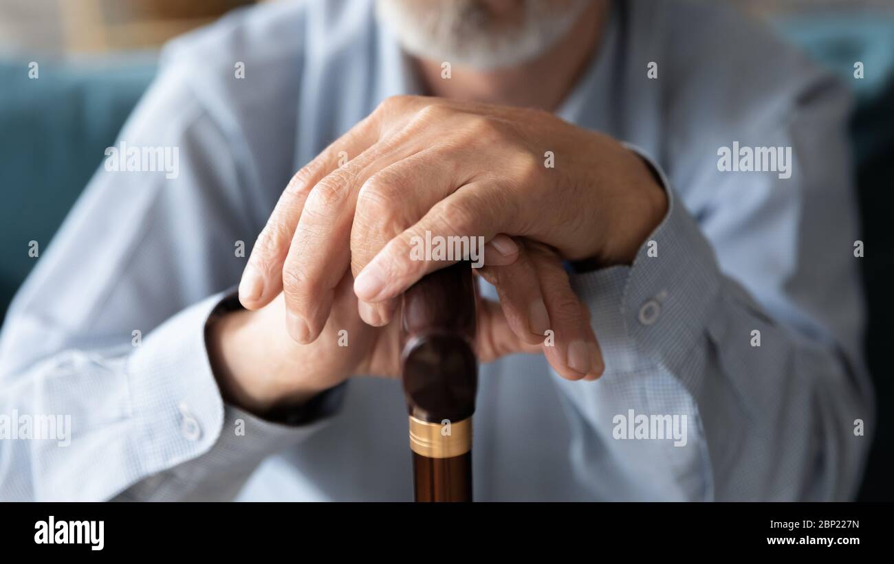 Exhausted old man walking cane hi-res stock photography and images - Alamy