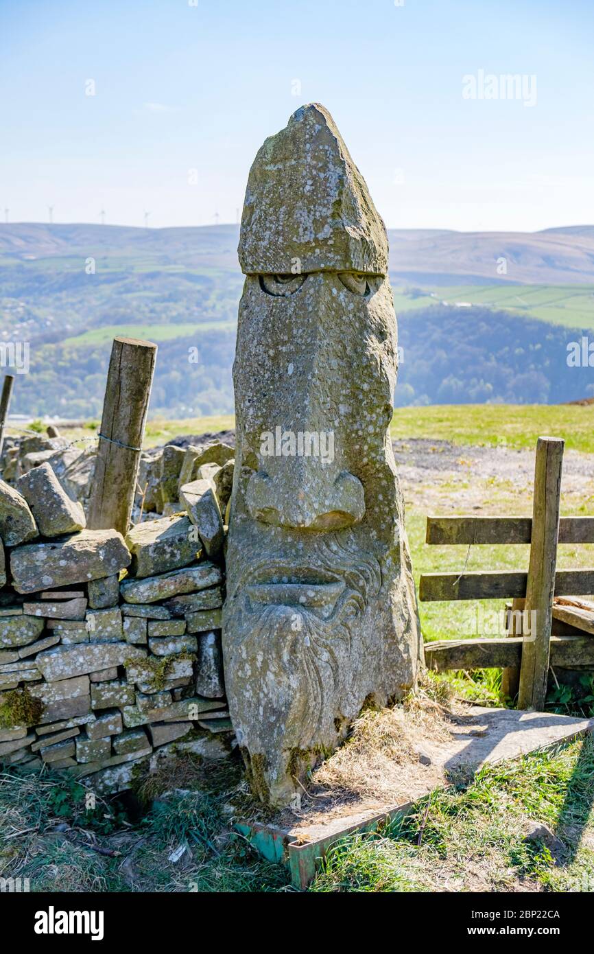 The Whirlaw Wizard Sculpture sits below, The Bridestones, Gritstone ...