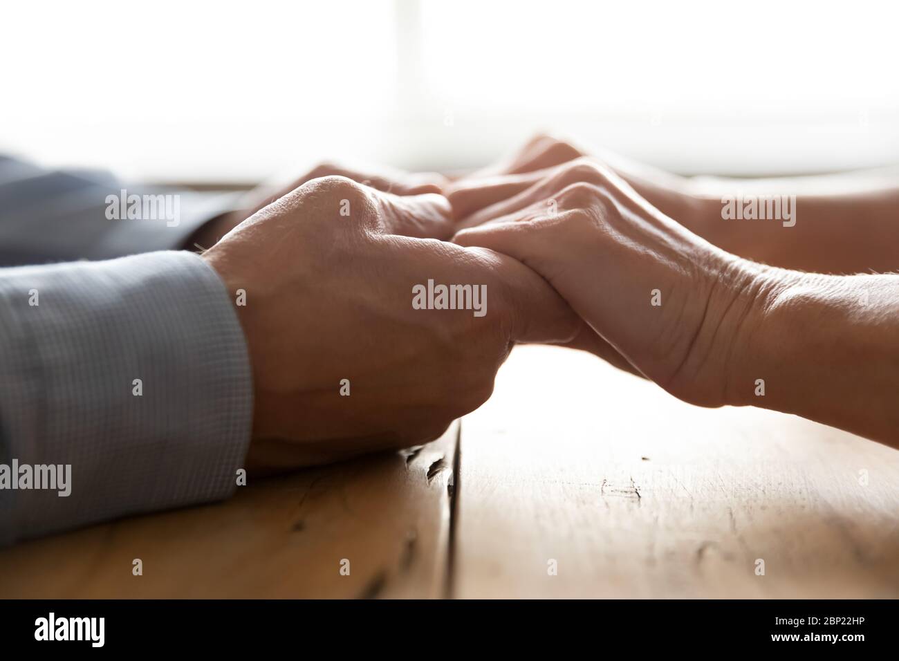 Older loving husband supporting senior woman, giving psychological help ...