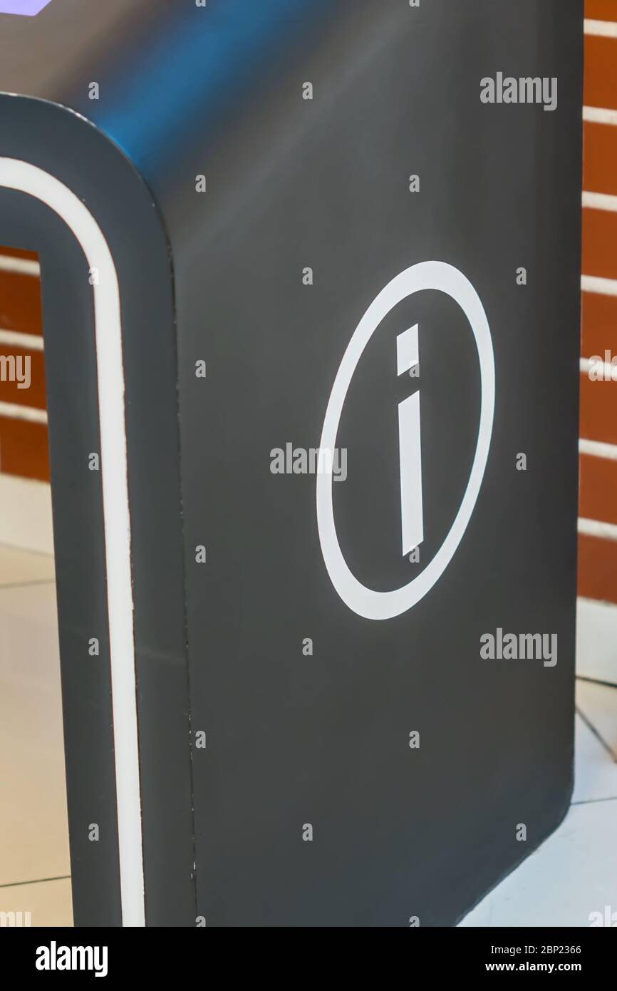 information sign on help post in shapping mall Stock Photo - Alamy