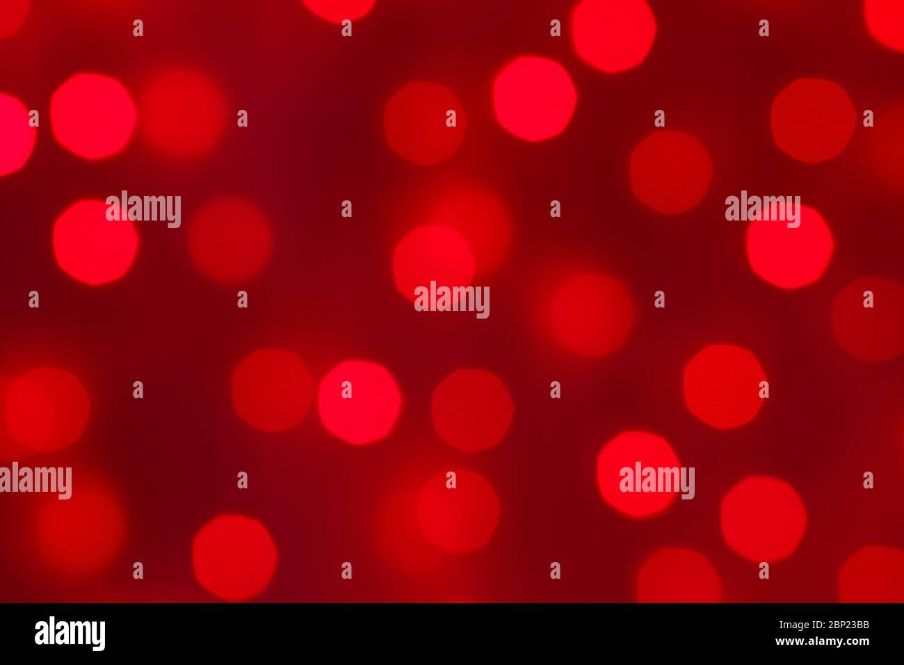 Decorative red LED lights on wires - Defocused gradient background ...