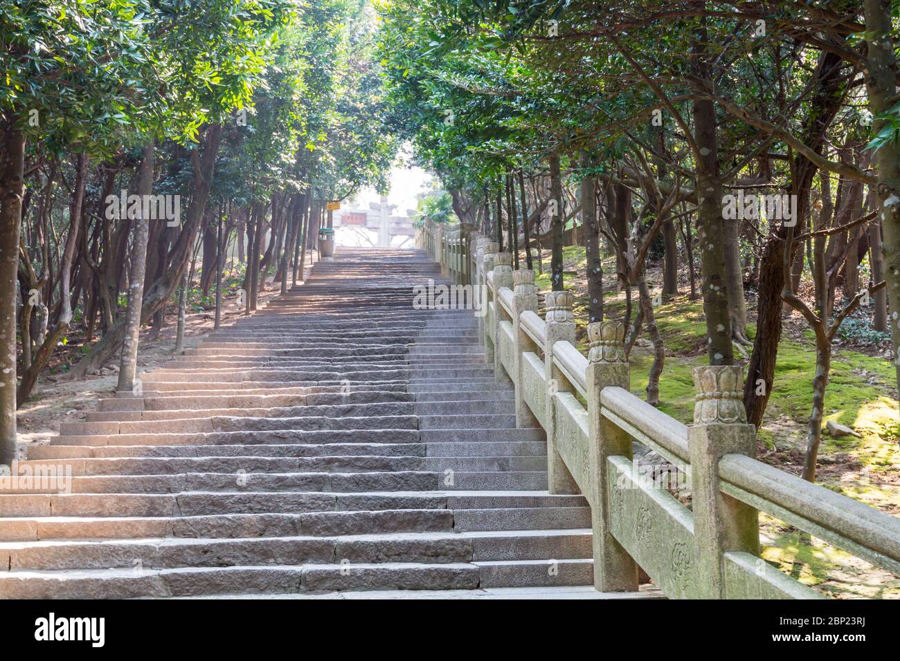 Stone staircases to the gateway of Mount Luojia, which lies in the ...