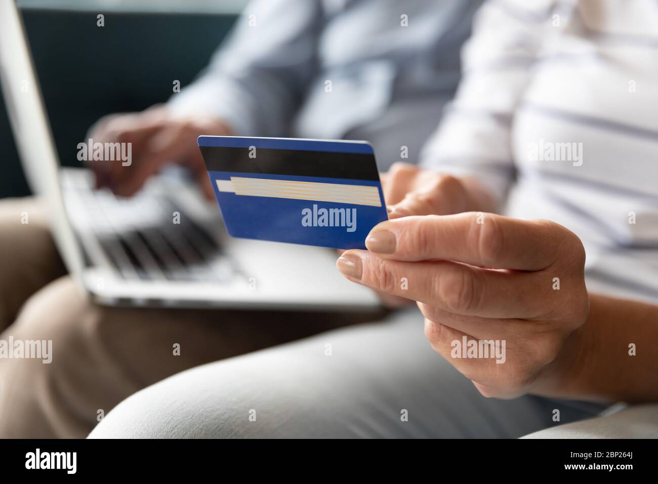 Old woman hand holding card hi-res stock photography and images - Alamy