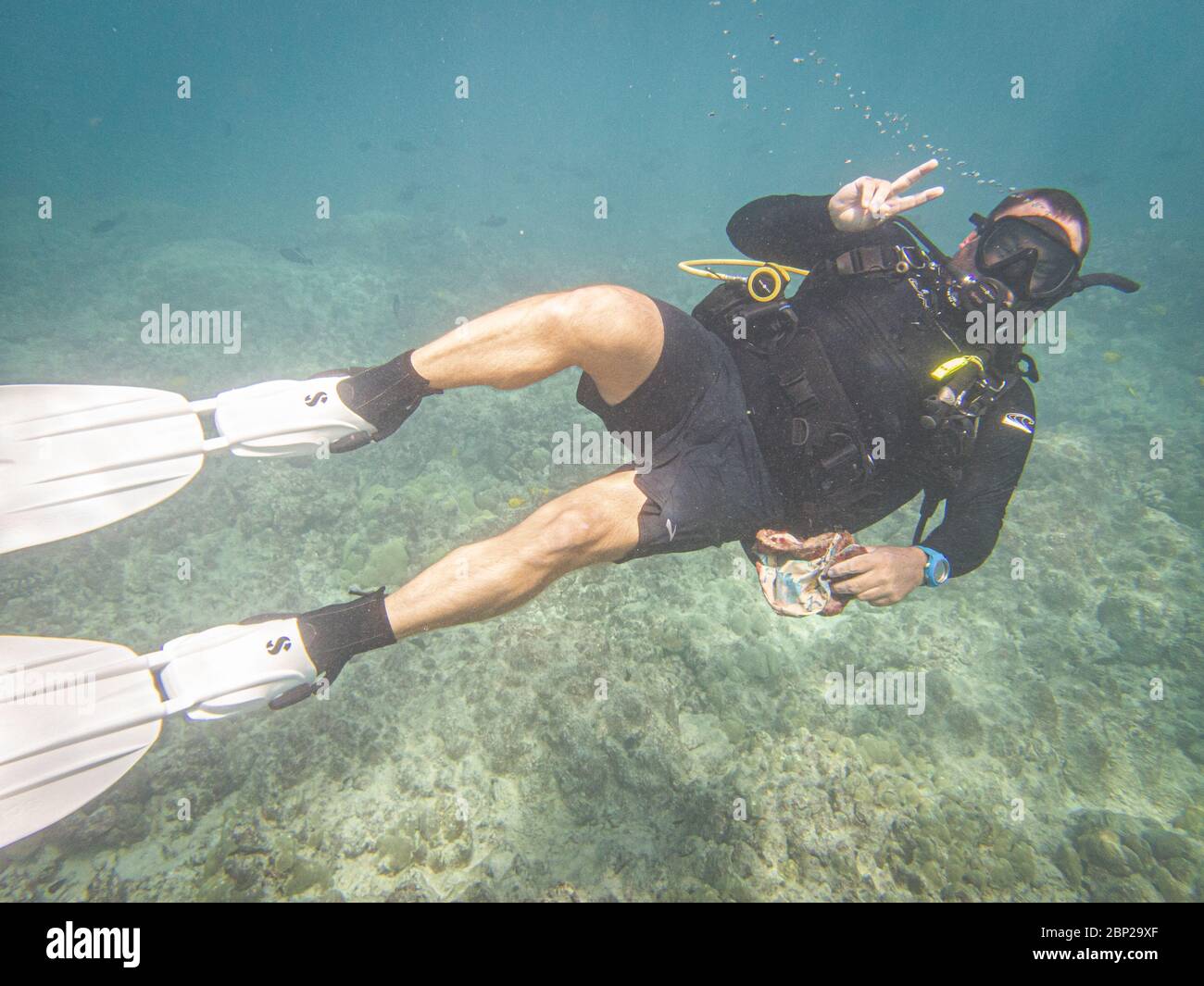 Man giving peace sign hi-res stock photography and images - Alamy