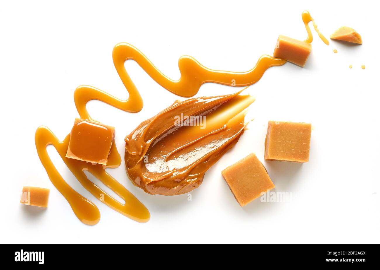 composition of caramel candies isolated on white background, top view ...