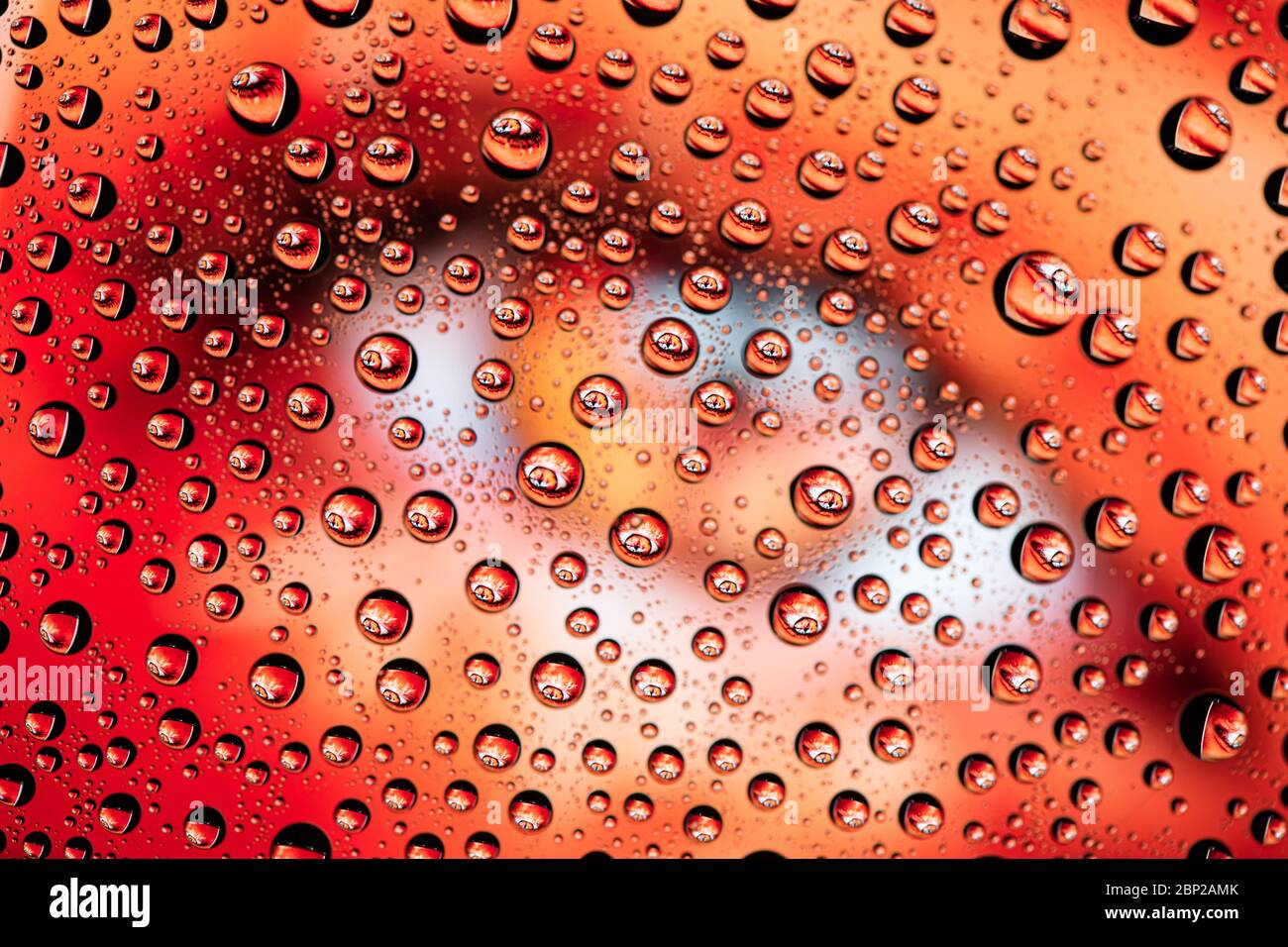 Female eye through drops of water on glass Stock Photo - Alamy