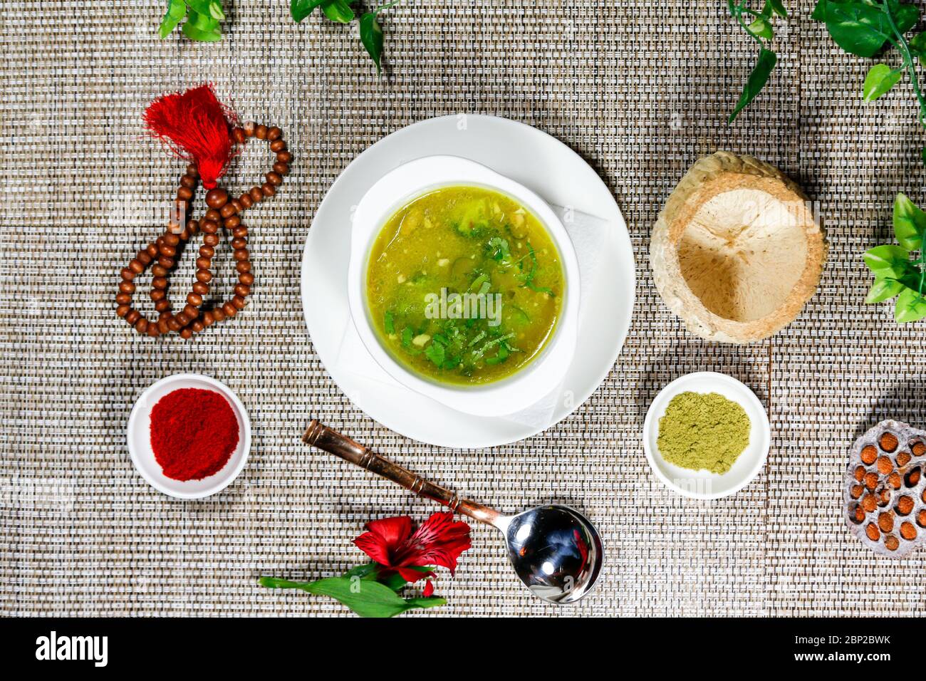 Traditional Indian vegetable soup with herbs and spices on a served ...