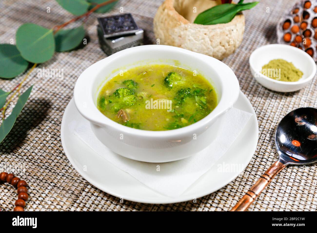 Traditional Indian vegetable soup with herbs and spices on a served ...