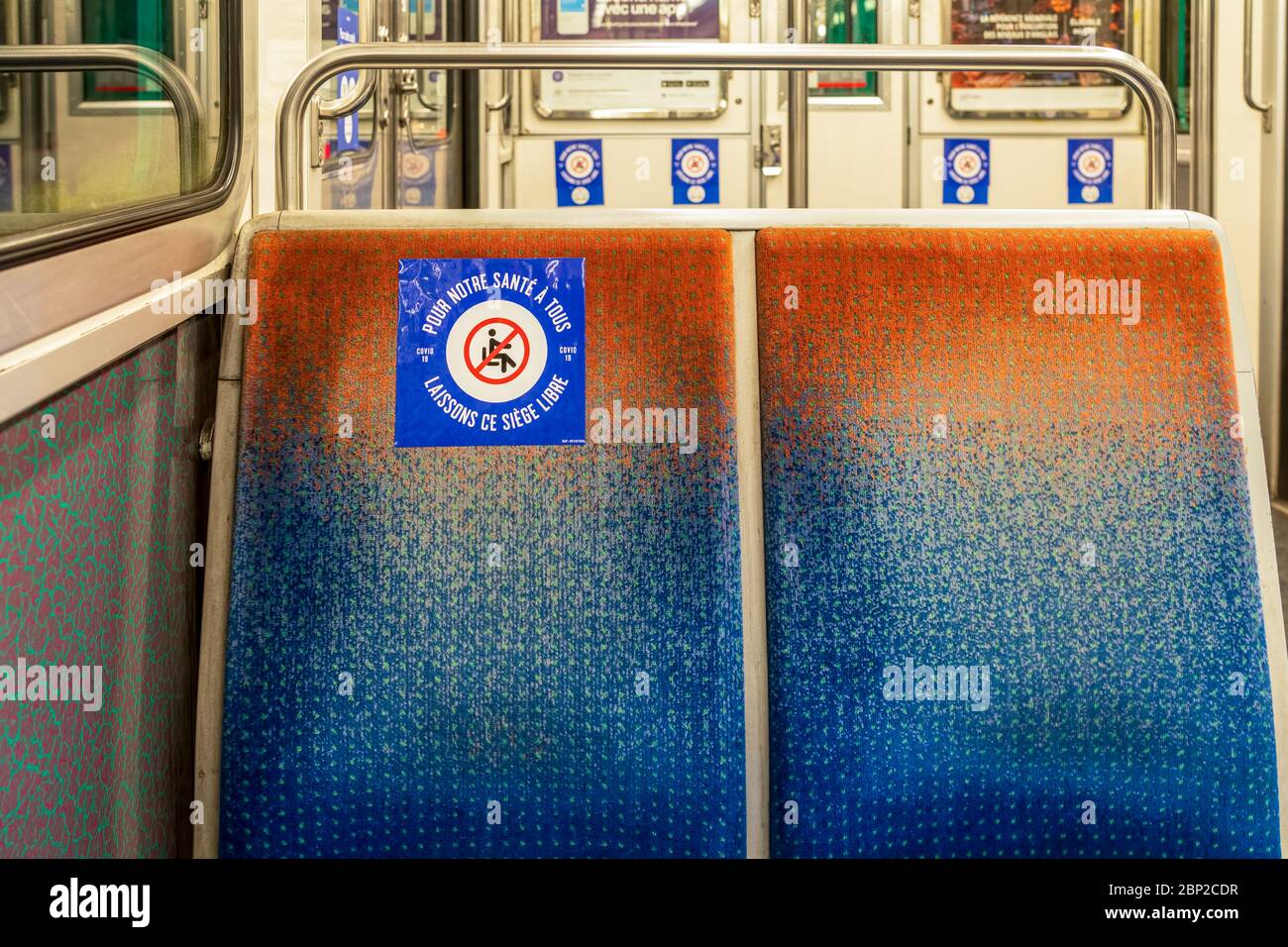 Do not sit sticker in Paris Metro during Covid-19 pandemic Stock Photo ...