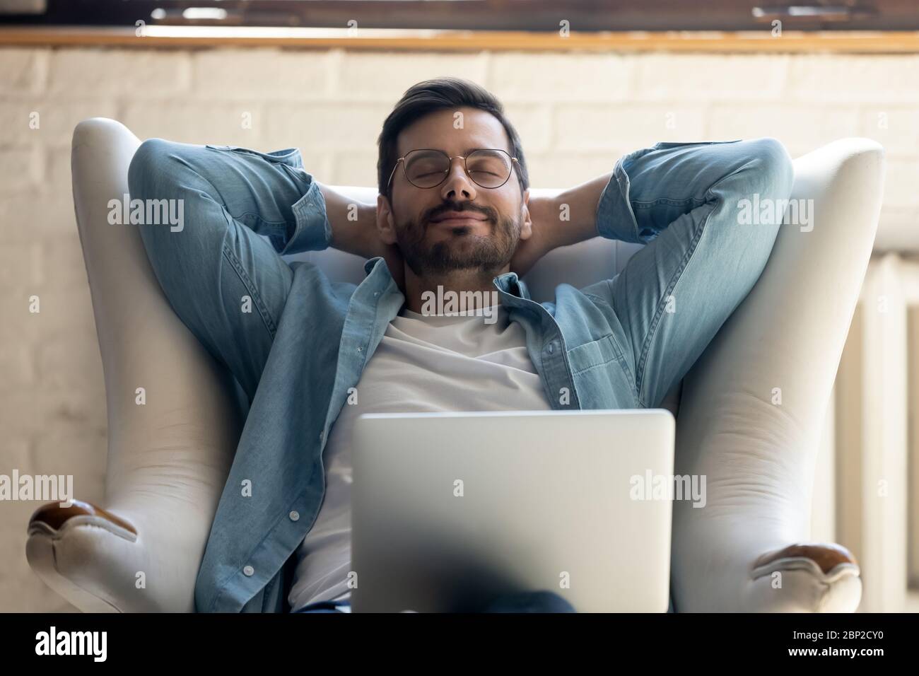 Leaning back relaxing stretching hi-res stock photography and images ...