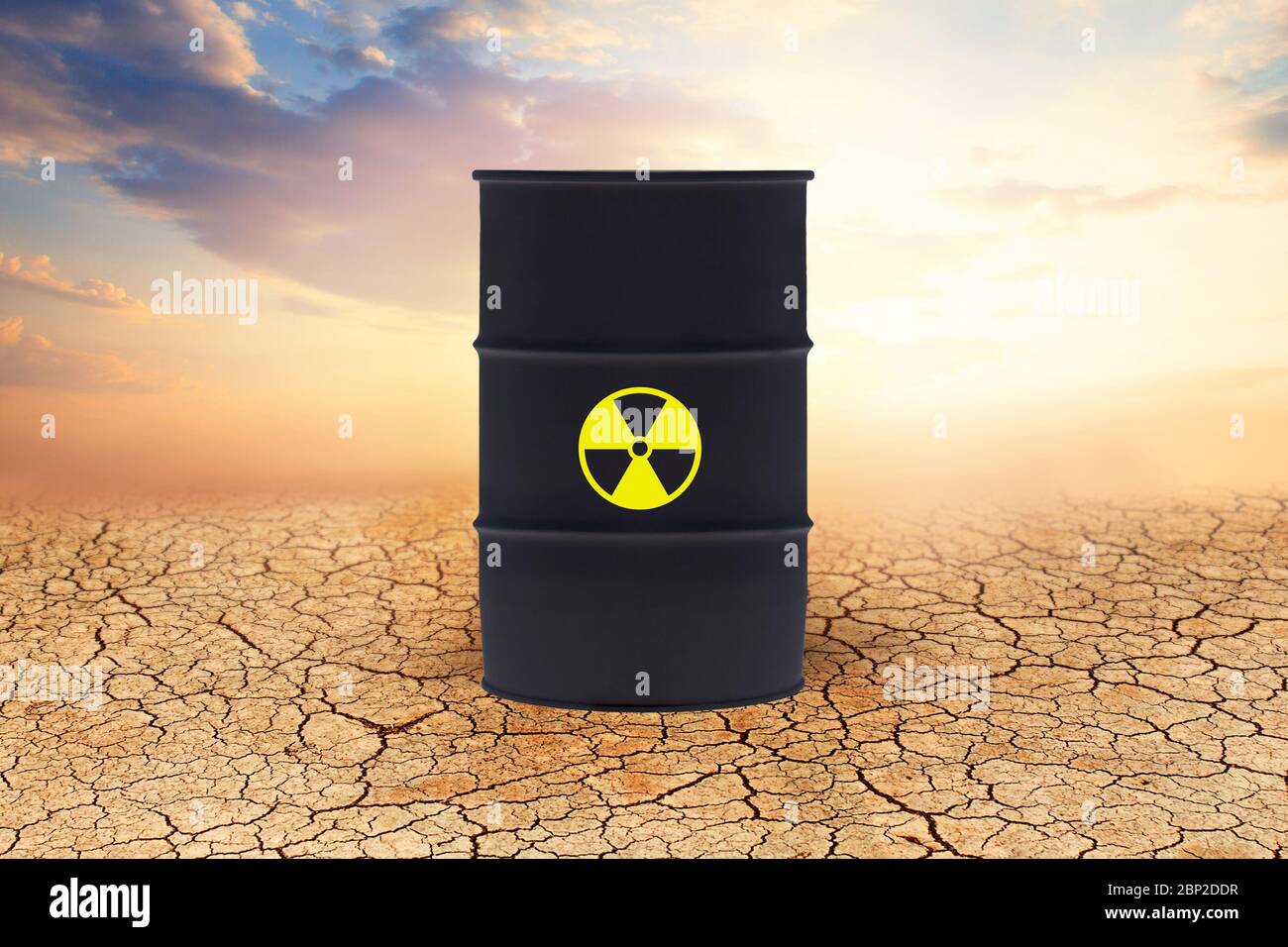 Radioactive waste barrel against sky clouds. Radioactive waste barrels ...