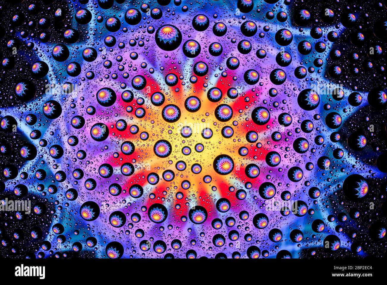 multi-colored mandala through drops of water on glass Stock Photo - Alamy