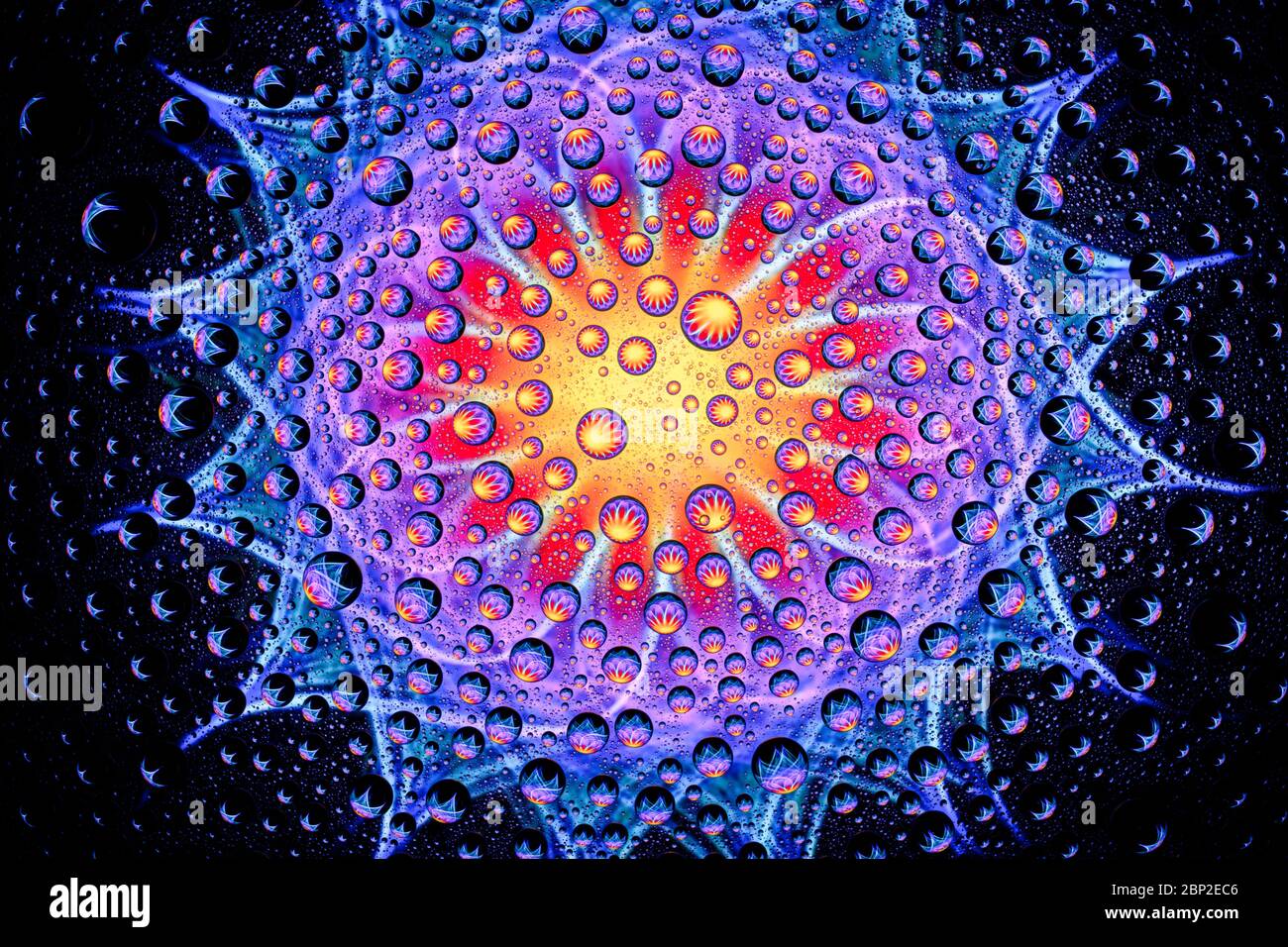 multi-colored mandala through drops of water on glass Stock Photo - Alamy