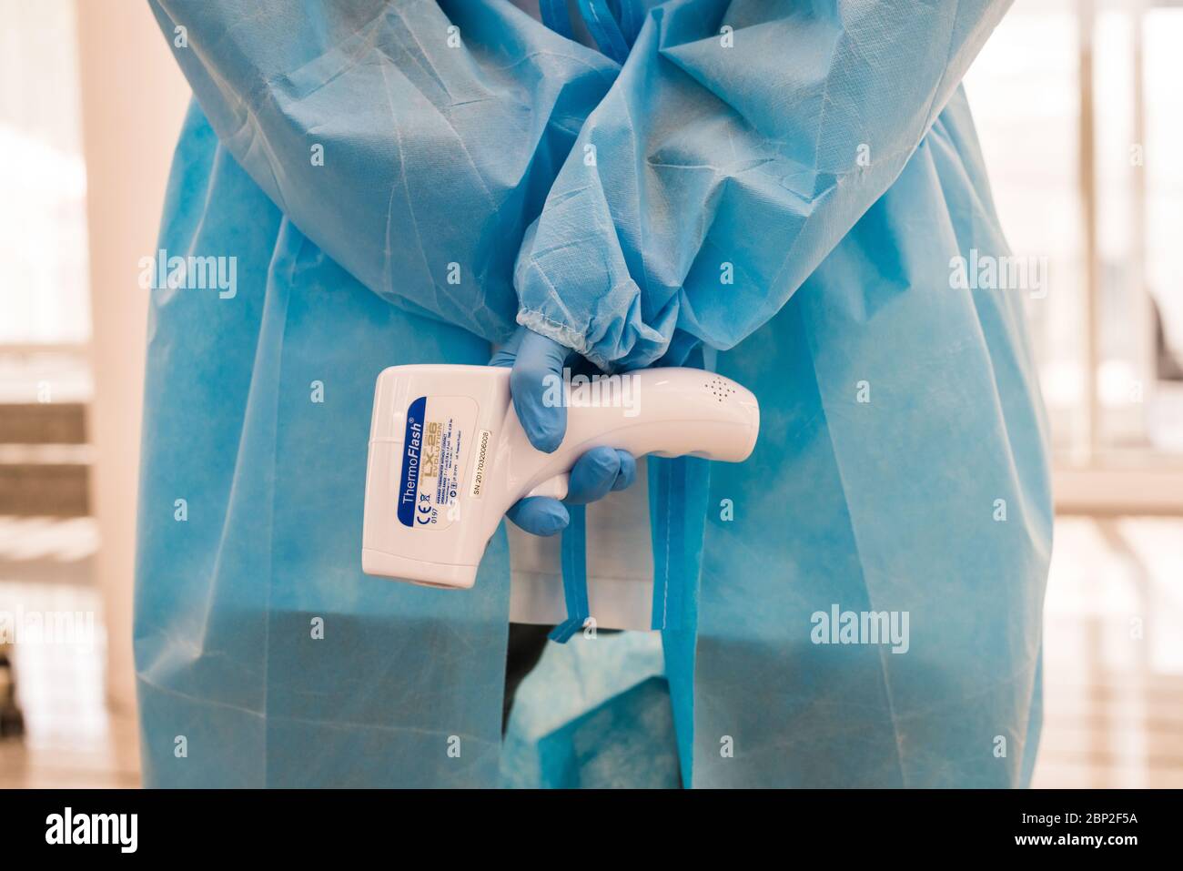 Patient temperature measurement with a forehead thermometer at the ...