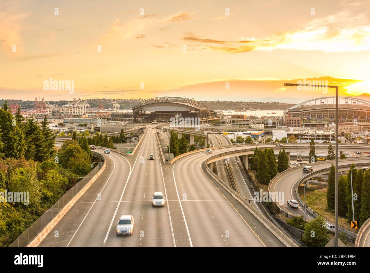Seattle skylines and Interstate freeways converge with Elliott Bay and ...