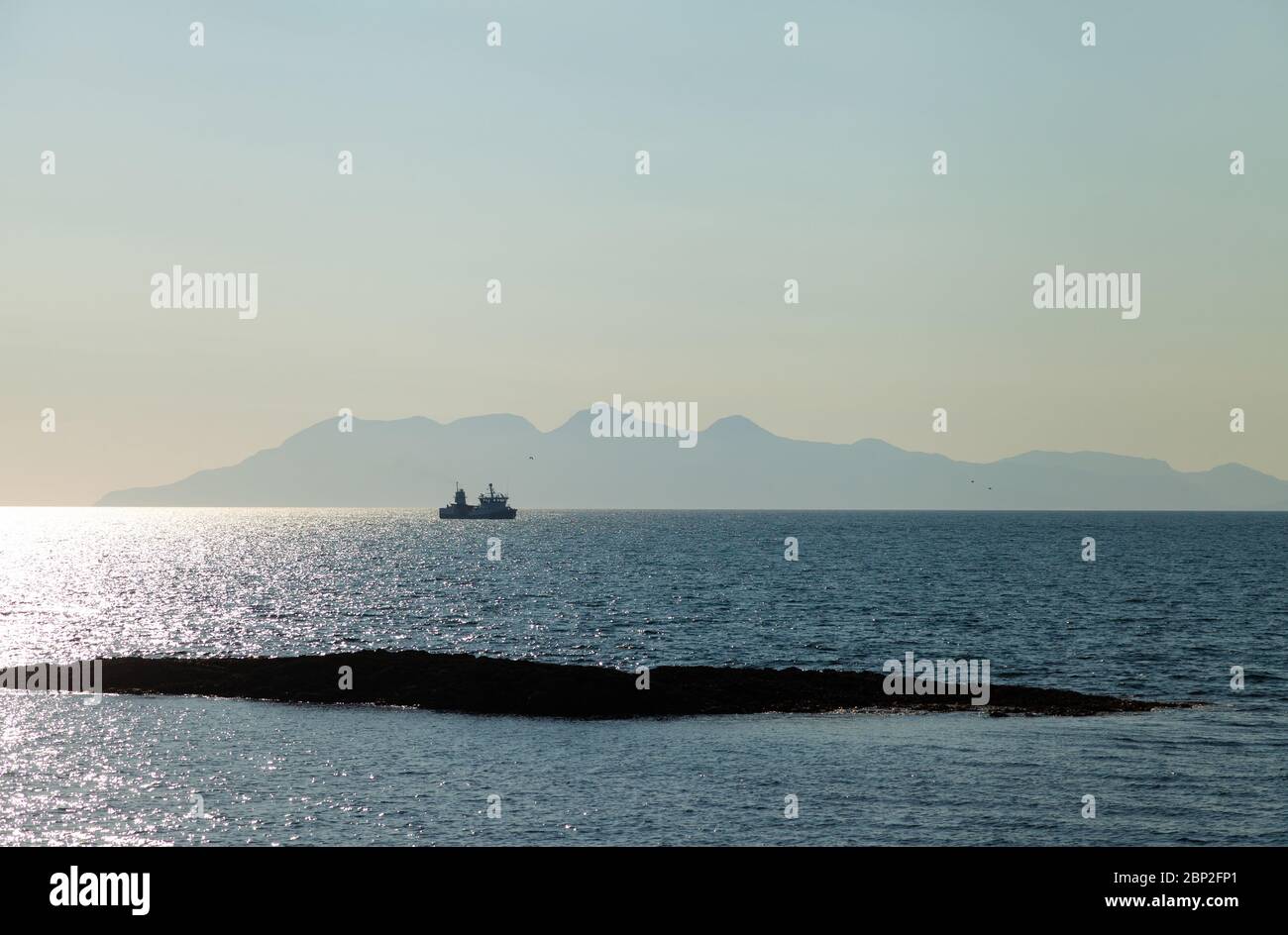 The Isle of Rum from the port of Mallaig on the West Coast of Scotland ...