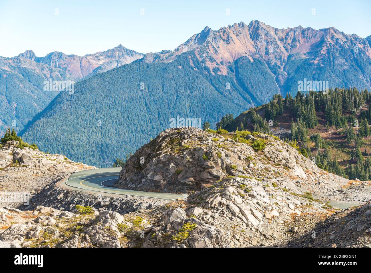 scenic view of curve and slope asphalt road on the mountain on the day ...