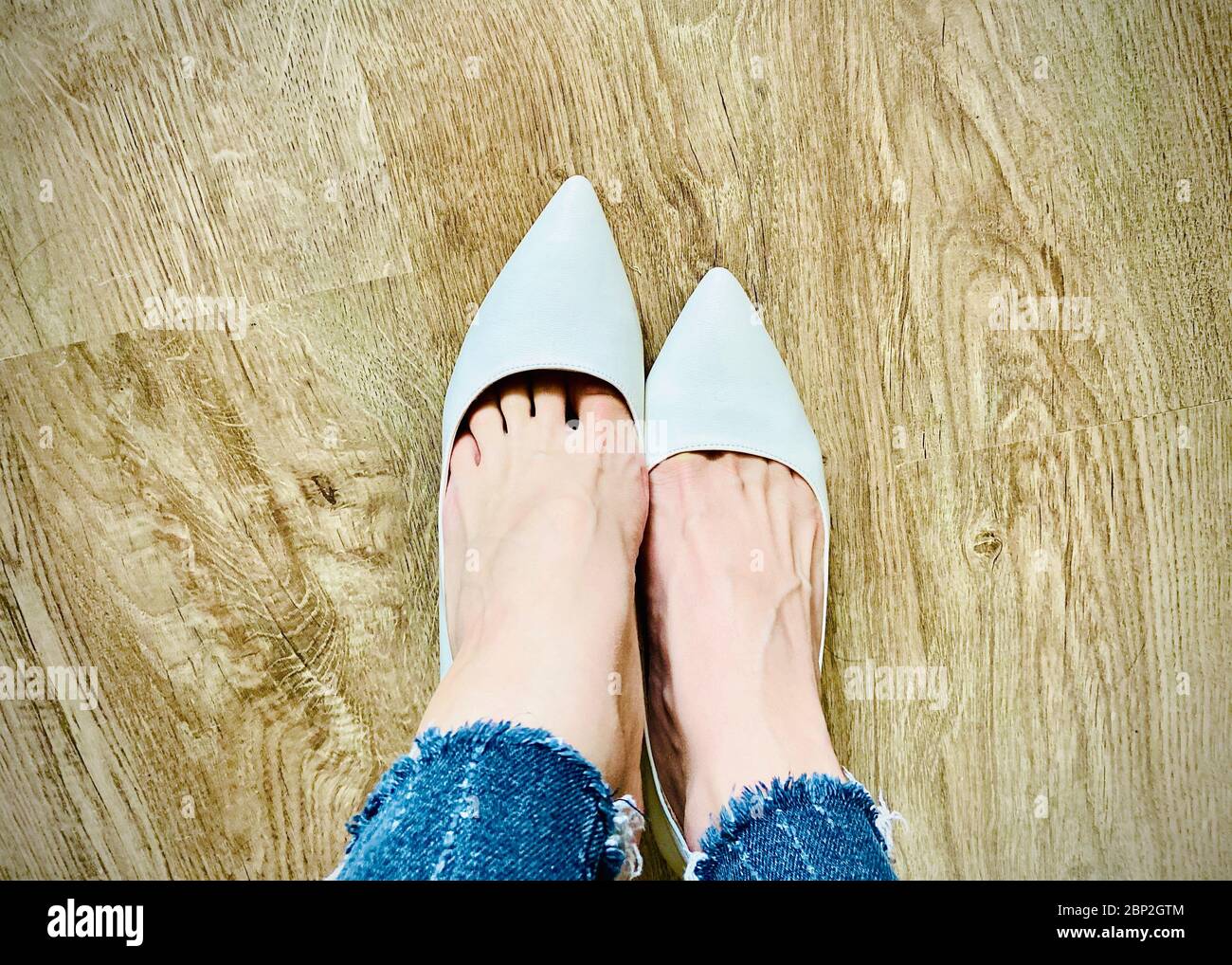 Woman wearing flip flops hi-res stock photography and images - Alamy